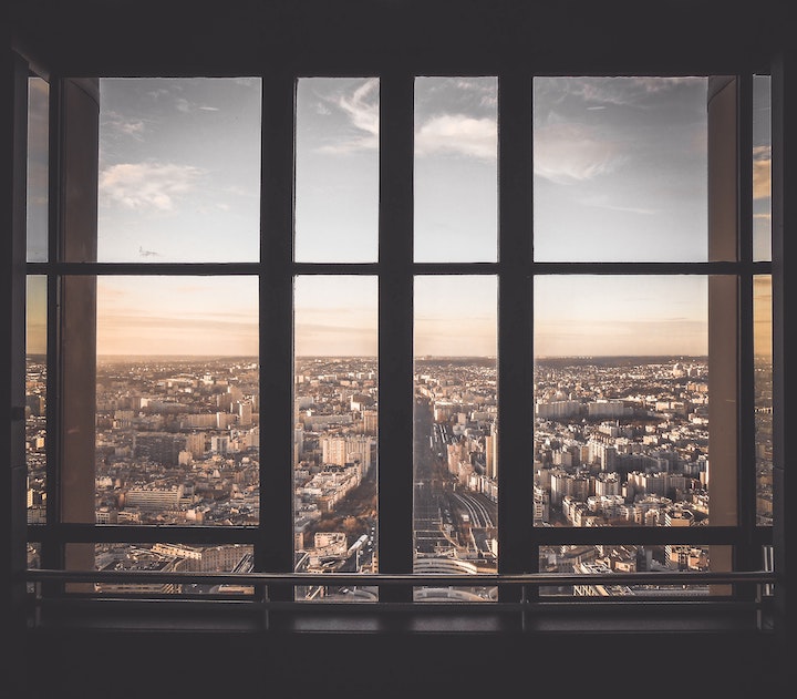A giant window with a beautiful view of the city shows how to use a ...