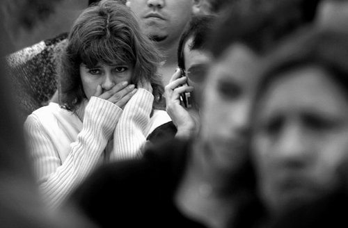 Sandra Gil standing in a long line of visitors, outside the Krome ...
